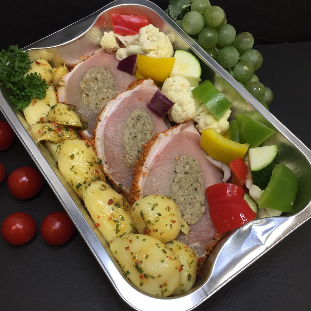 Stuffed Pork Chop Dinner- 3 pork loin chops with chopped veg and baby ...